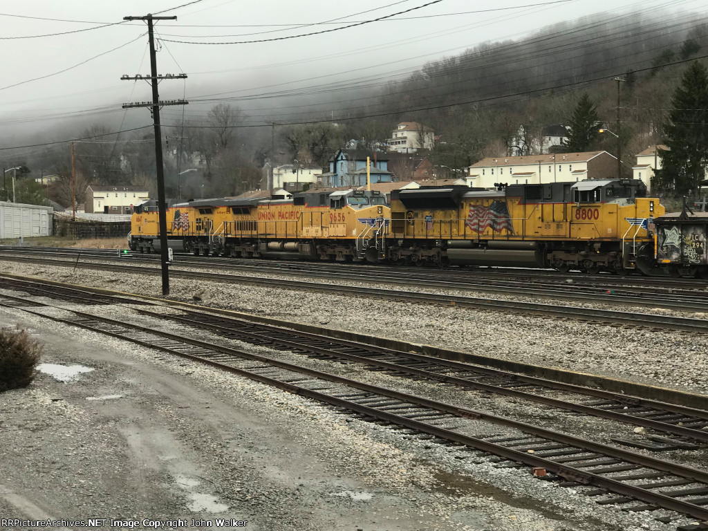 Westbound coal train moves through the yard